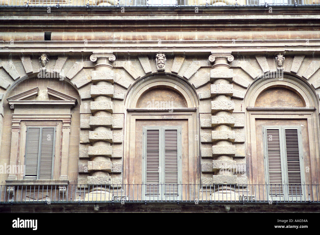 Three arched windows, traditional architecture in Florence, Tuscany ...
