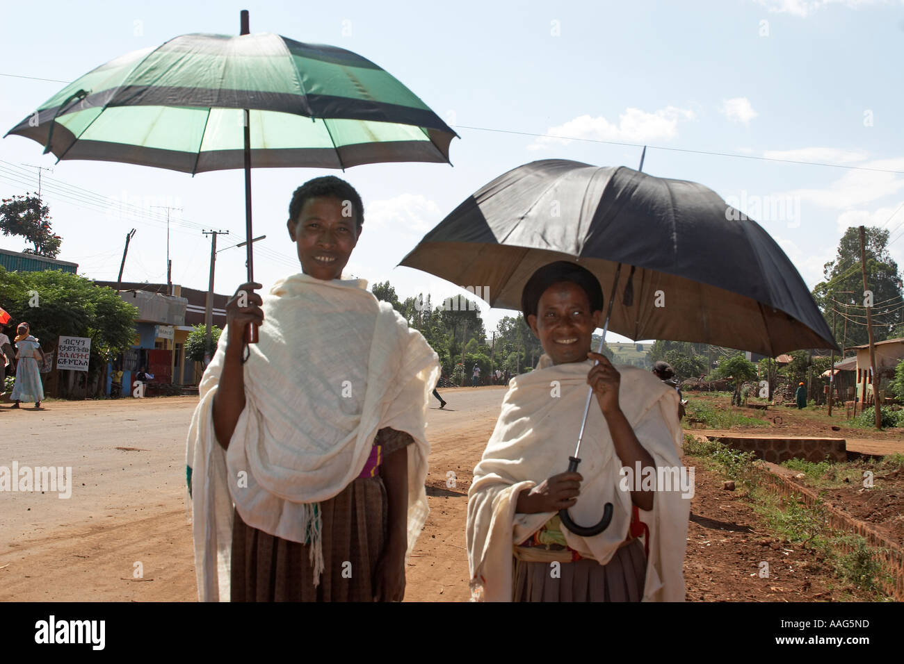 Portrait two women umbrellas hi-res stock photography and images - Alamy