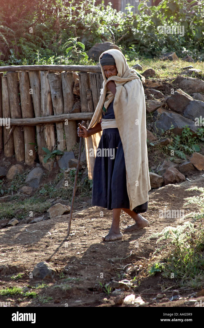 Old african woman walking stick hi-res stock photography and images - Alamy