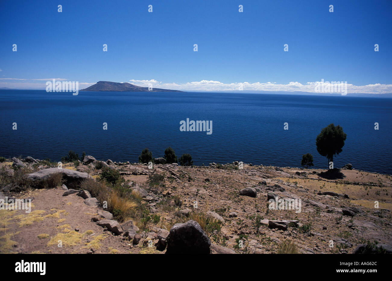 Agricultural terraces on Taquile island The still blue waters of Lake ...