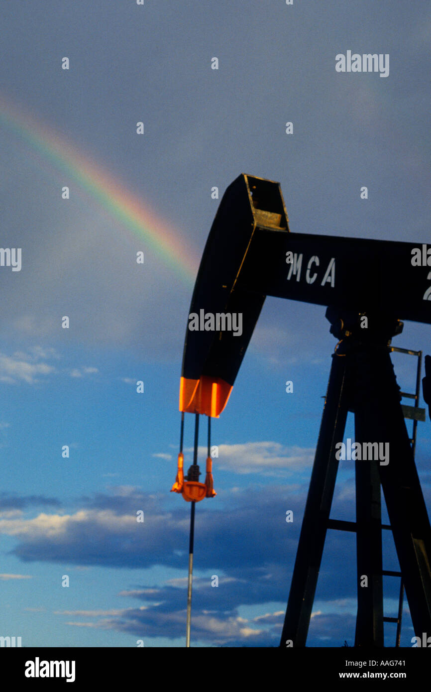 Oil Pumper with Rainbow Stock Photo - Alamy