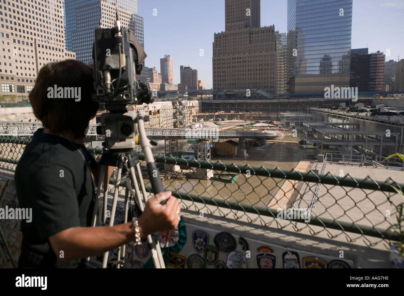 A tv crew cameraman shoots footage of the construction site at Ground ...