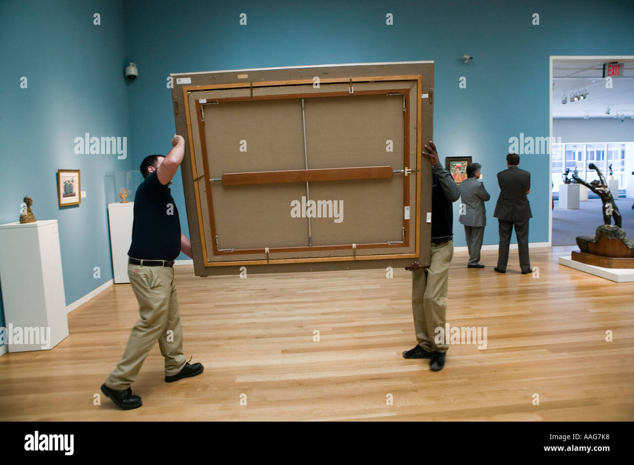 Workers carry Raoul Duffy painting during preview of Impressionism ...