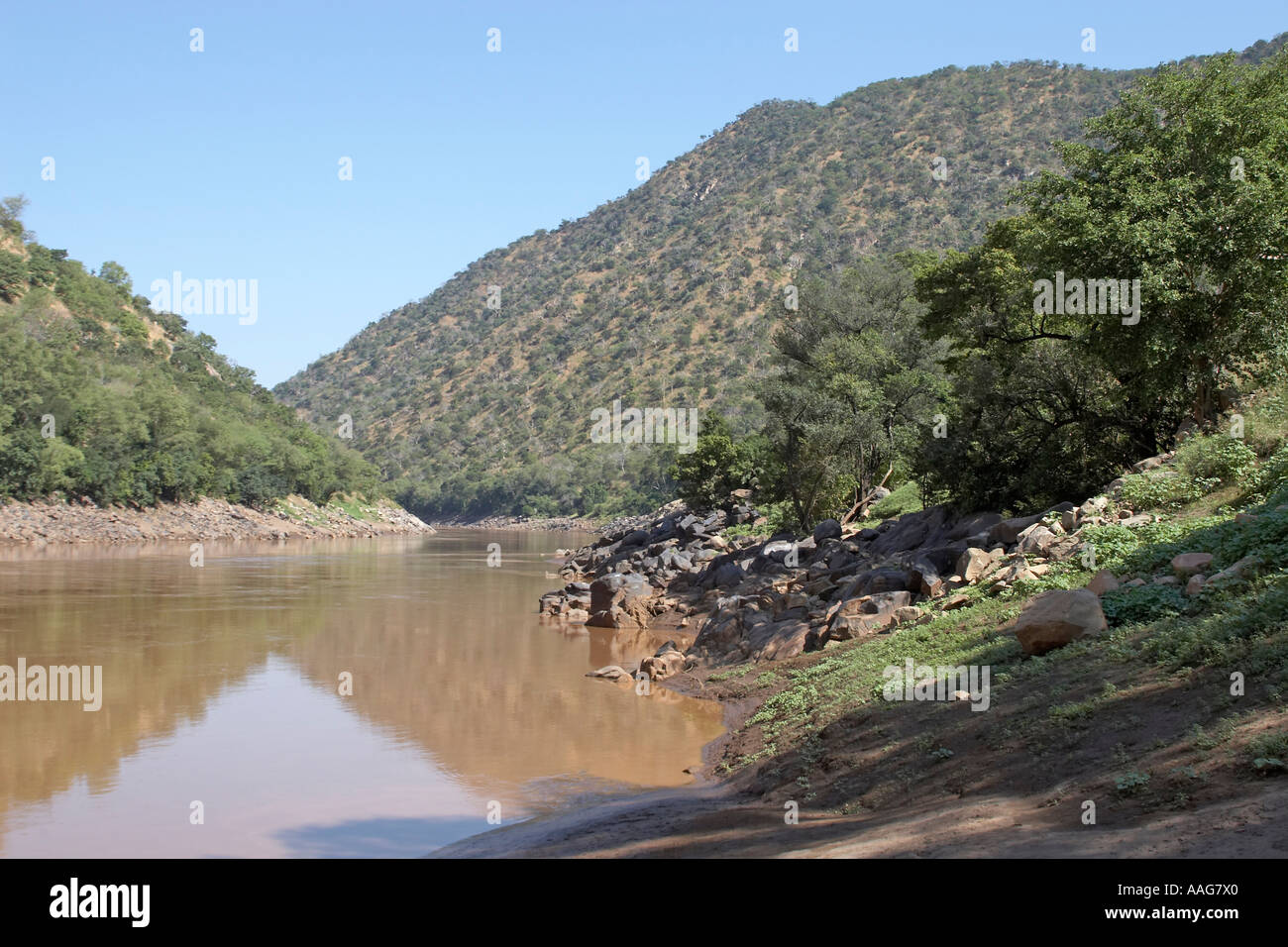 Dark volcanic rocks in Black Gorge of Blue Nile river near Bure Bridge ...
