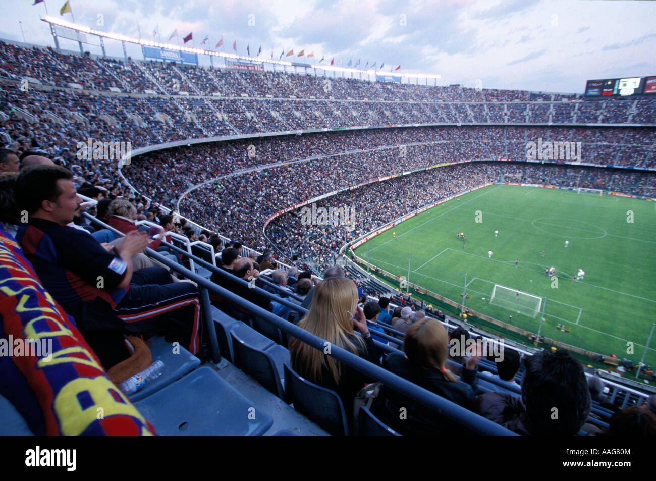 Spectators enjoying soccer match of FC Barcelona Camp Nou stadium ...