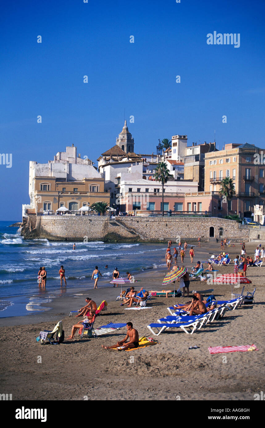 People relaxing at beach Platja de Sant Sebastia Sitges Costa Garraf ...