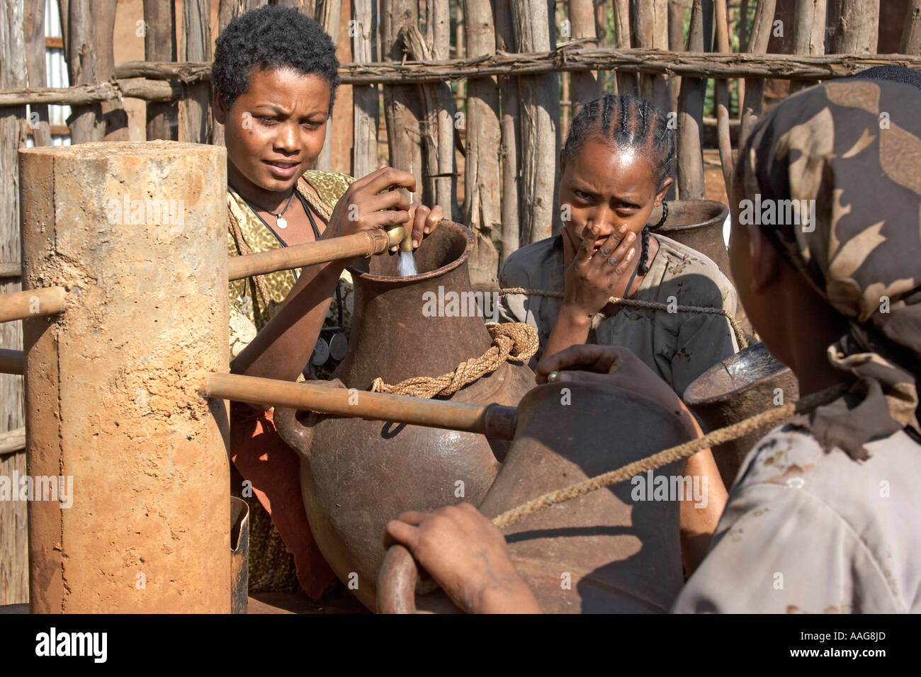 Woman carrying water jars hi-res stock photography and images - Alamy