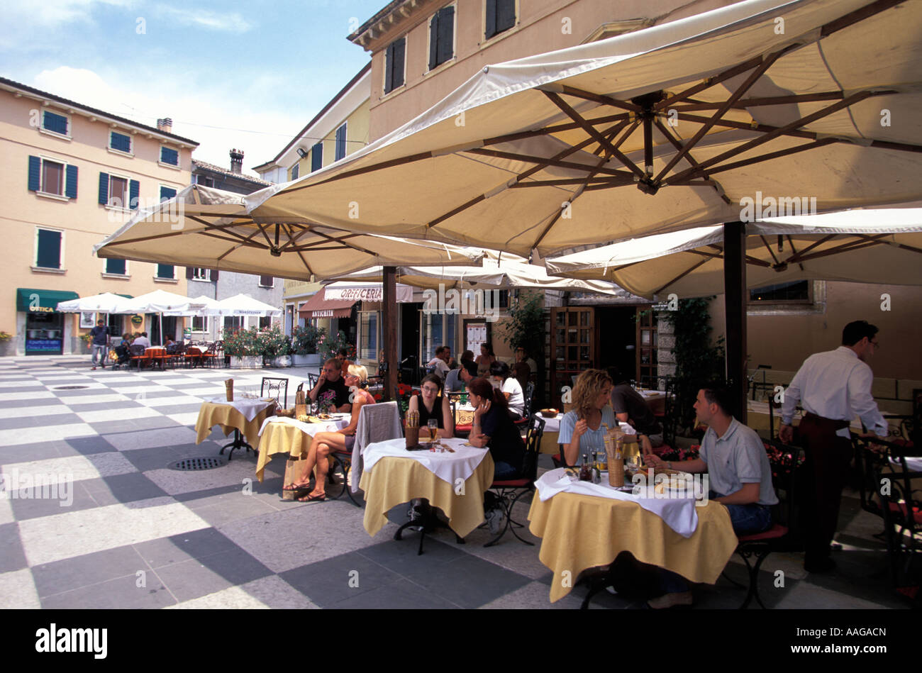 People sitting in a pavement cafe Lazise Lake Garda Veneto Italy Stock ...
