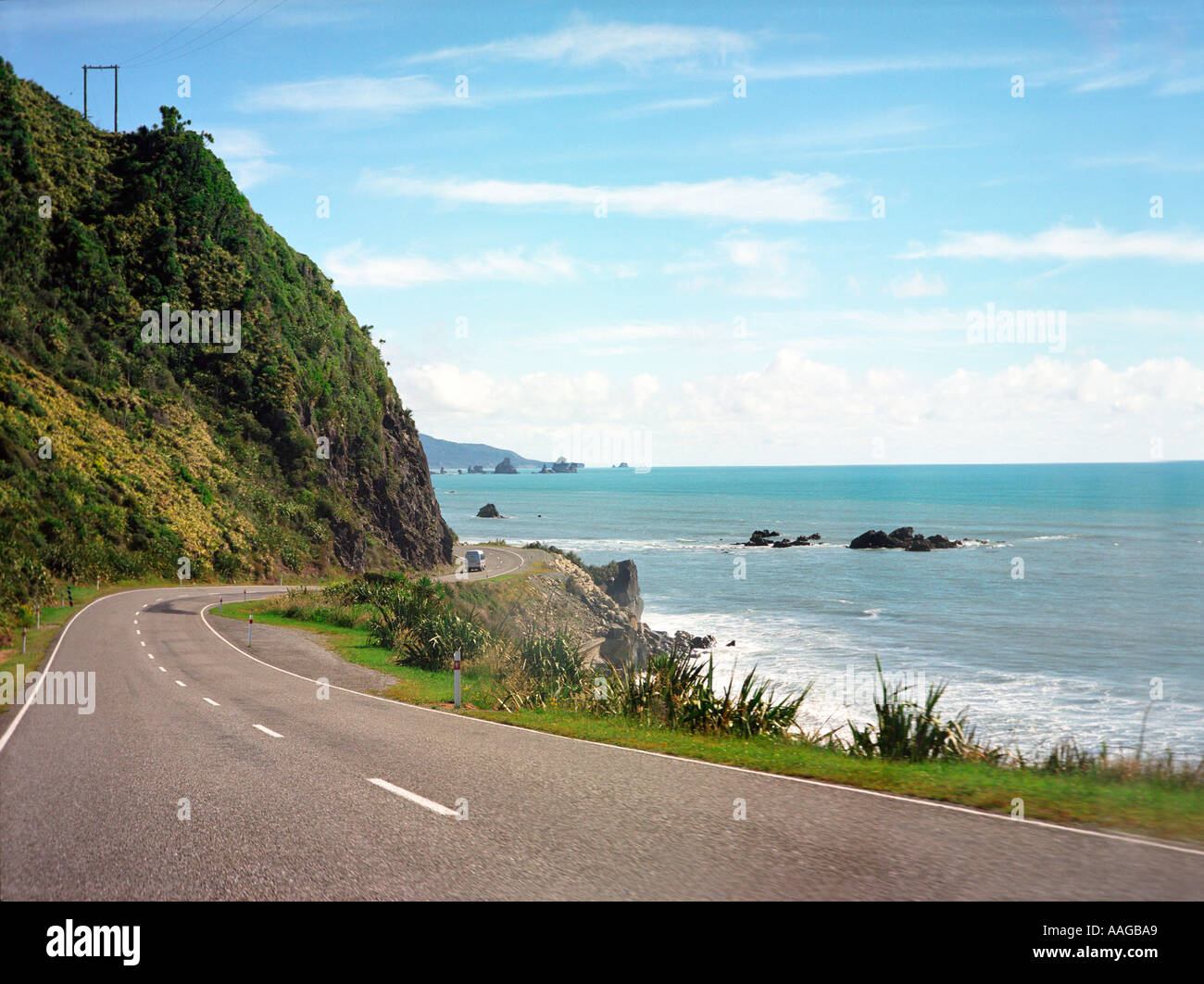 coastal road on driving holiday with ocean on horizon Stock Photo - Alamy