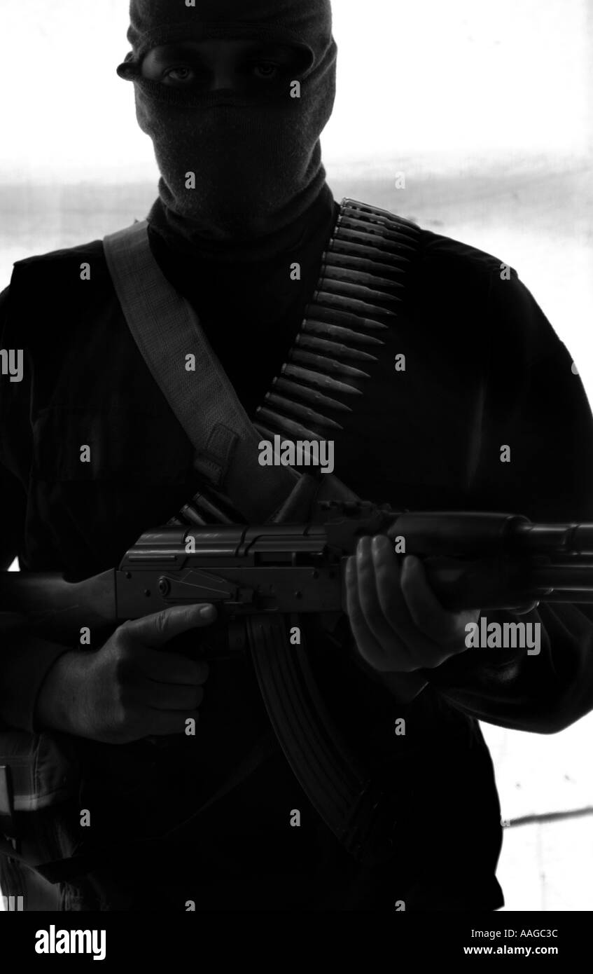Terrorist balaclava kalashnikov hi-res stock photography and images - Alamy