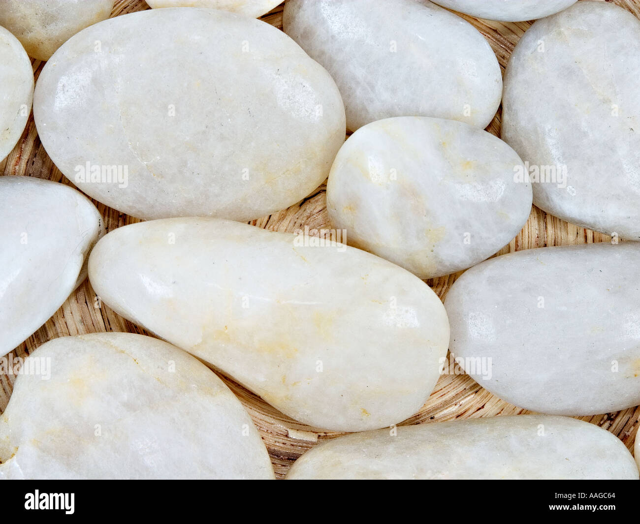 quartz pebbles on cane plate Stock Photo - Alamy