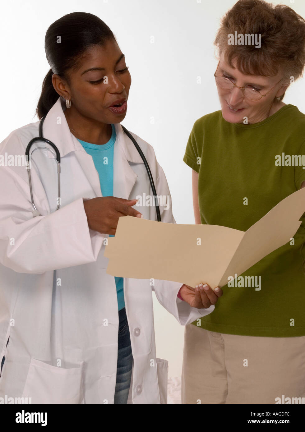 African American general practitioner discusses health results with ...