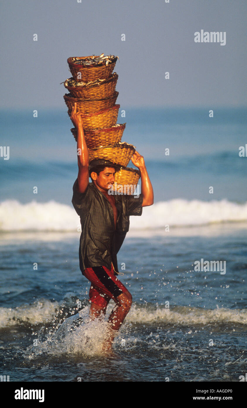Fisherman and baskets Colva Beach Goa India Stock Photo - Alamy