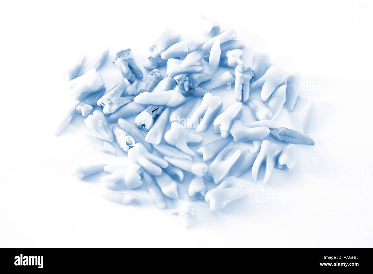 pile of real and fake teeth Stock Photo - Alamy