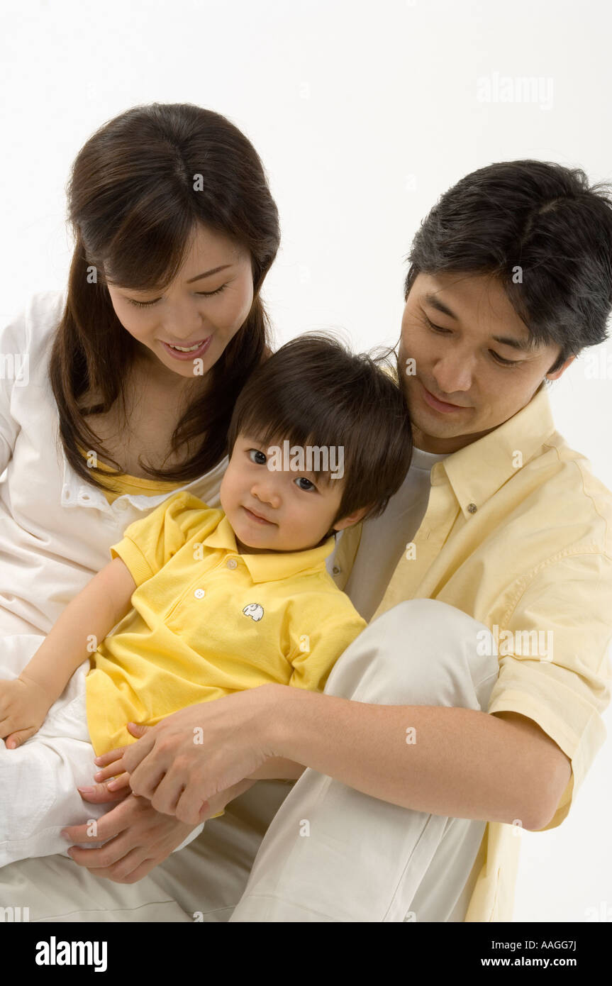 Family with one child Stock Photo - Alamy