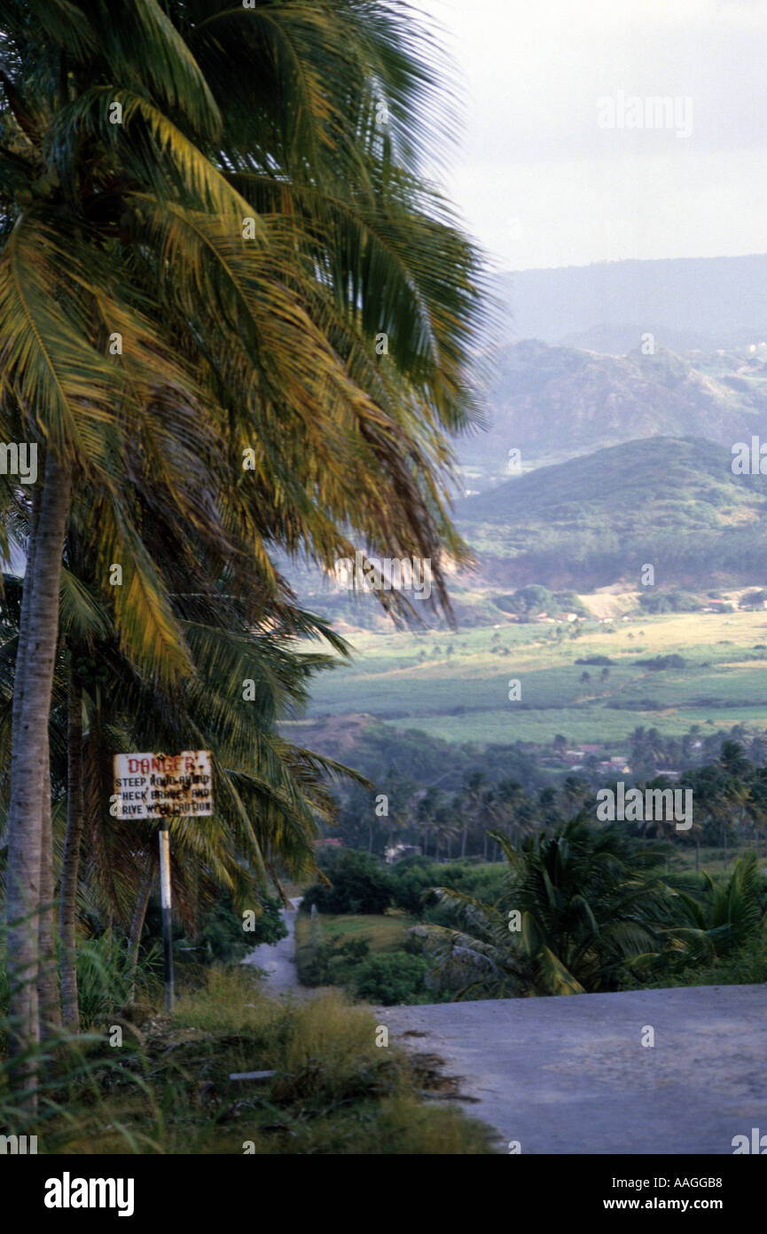 Hill in Barbados Caribbean with warning sign Stock Photo - Alamy