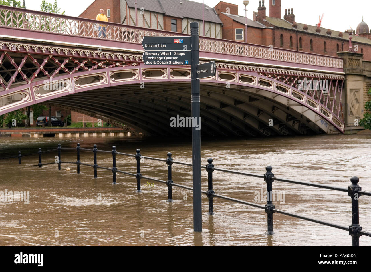 Flooded River Aire submerged sign on tow path at Crown Point Bridge ...