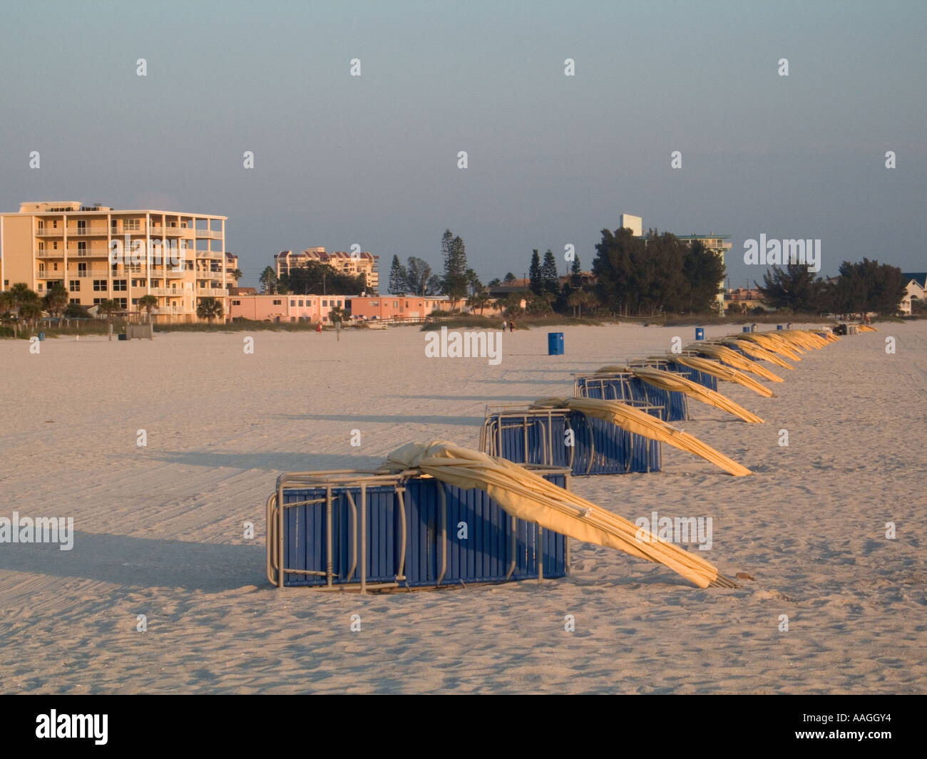 Sun is low over an empty west coast Florida beach near Tampa The beach ...