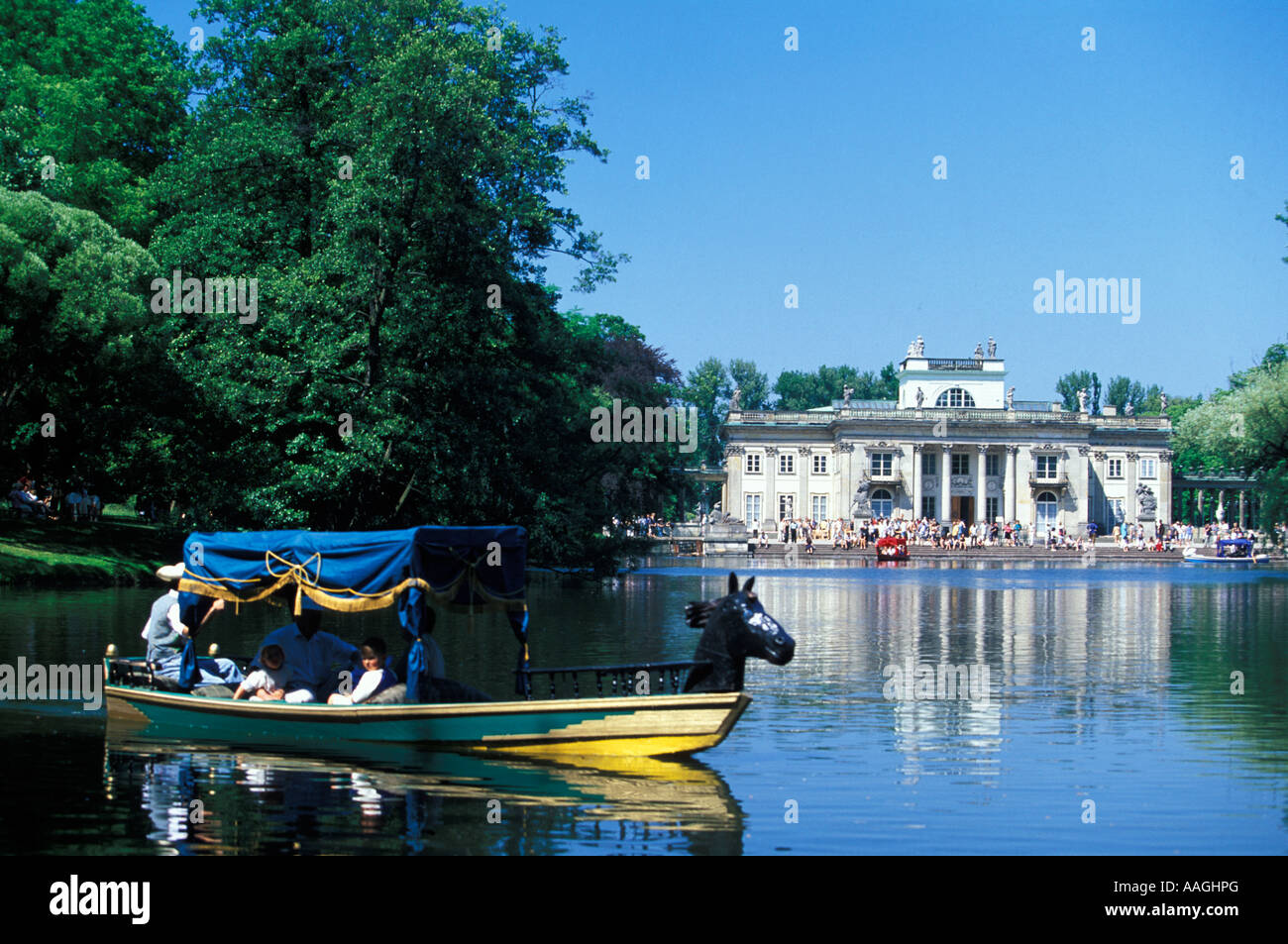 Pleasure boat with tourists on lake in front of Belvedere Palace ...