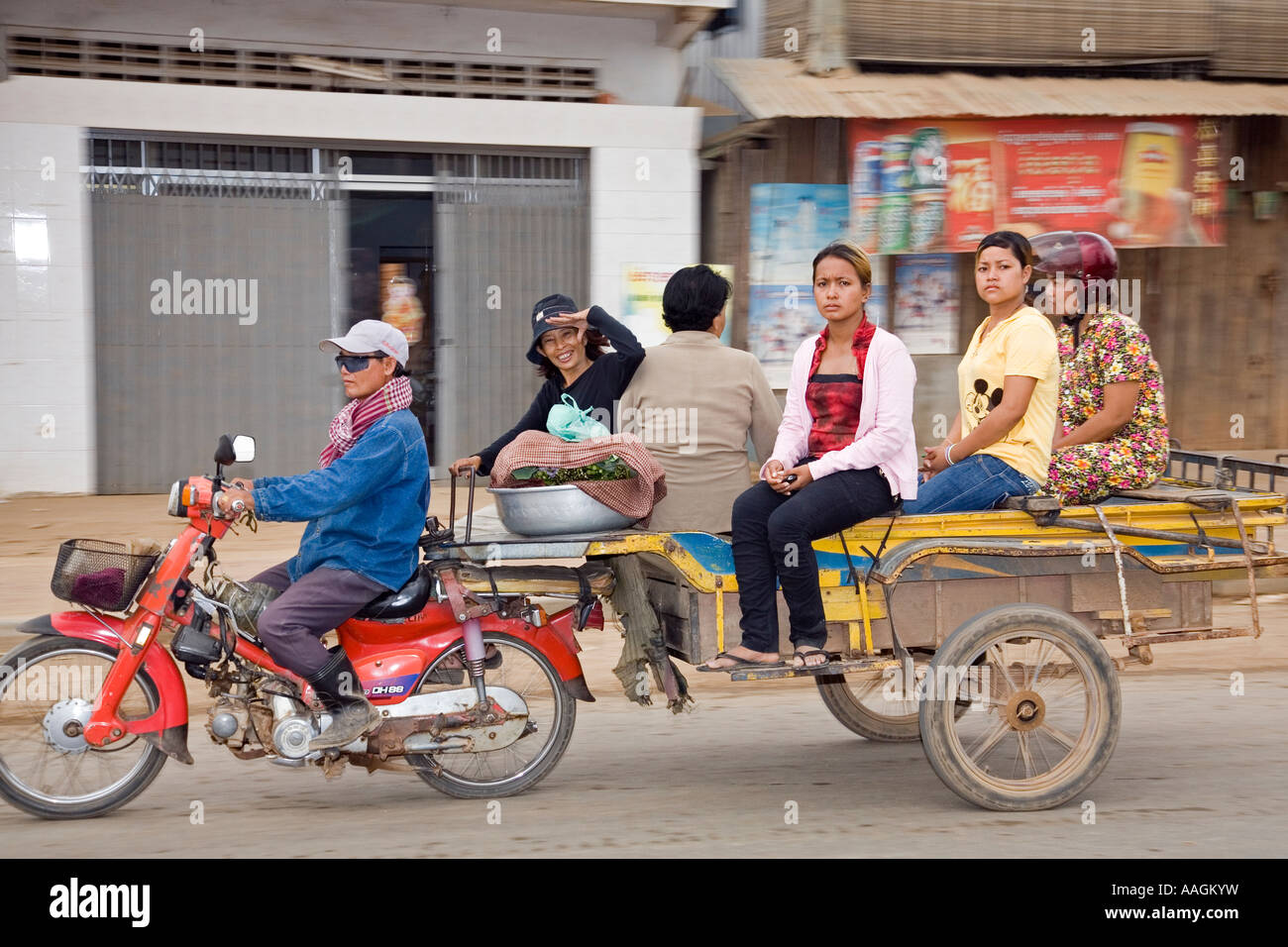 Rural tuk tuk taxi and passengers, Takmao, Cambodia Stock Photo - Alamy