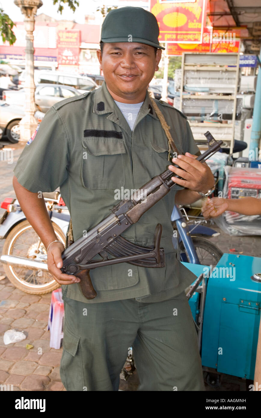 Soldier with rifle Phnom Penh Cambodia Stock Photo - Alamy