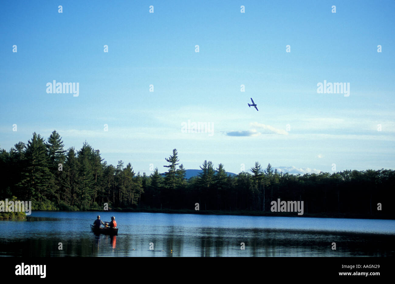 Small plane flying over mountain hi-res stock photography and images ...