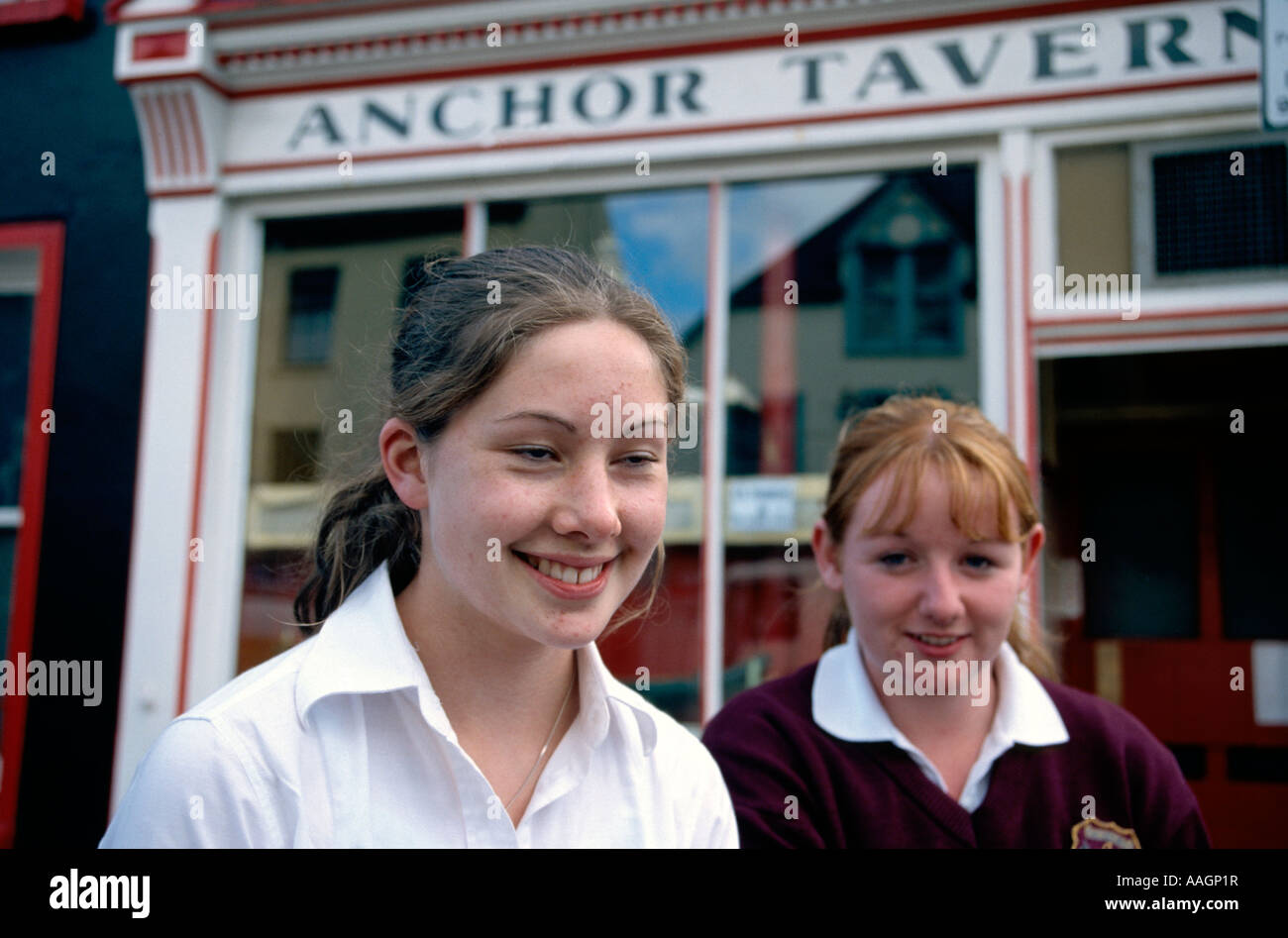 Two pupils outside Anchor Tavern Bantry County West Cork Ireland Stock ...