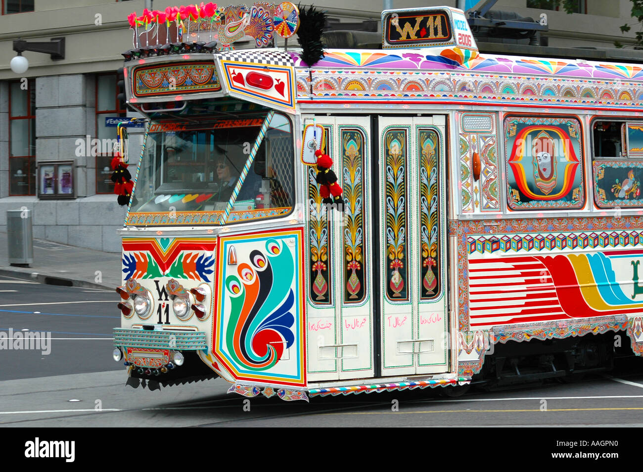 Colorful W11 Karachi tram Stock Photo - Alamy