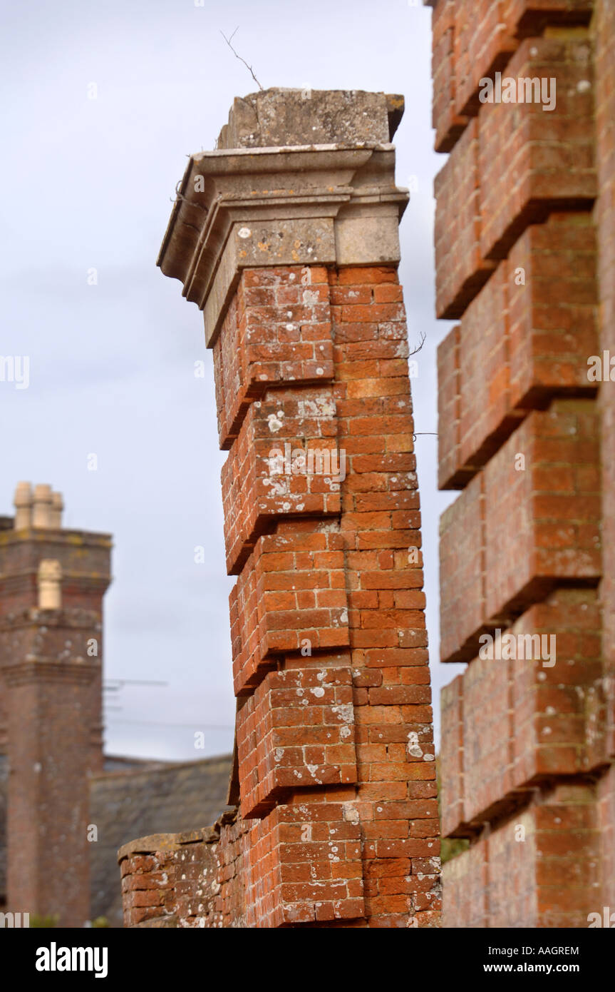 A OLD RED BRICK GATEWAY PILLAR IN NEED OF RESTORATION TO CORRECT ITS ...