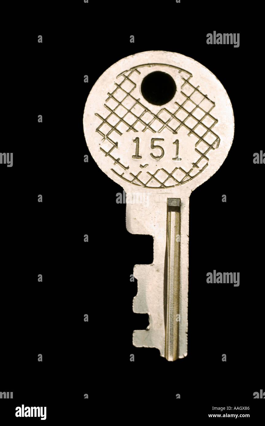 close up from above of small silver key Stock Photo - Alamy