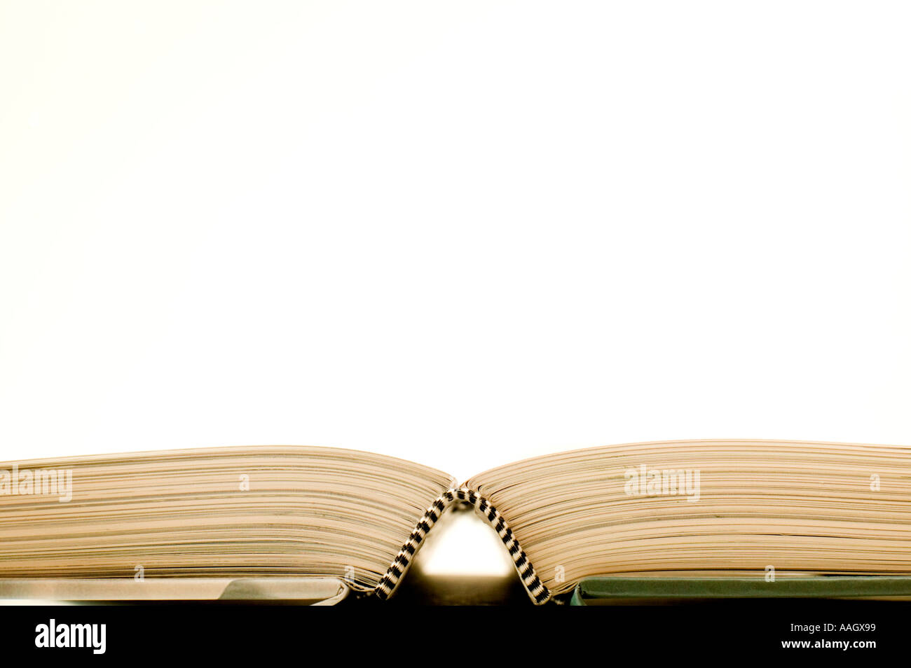 close up of open book pages and spine Stock Photo - Alamy