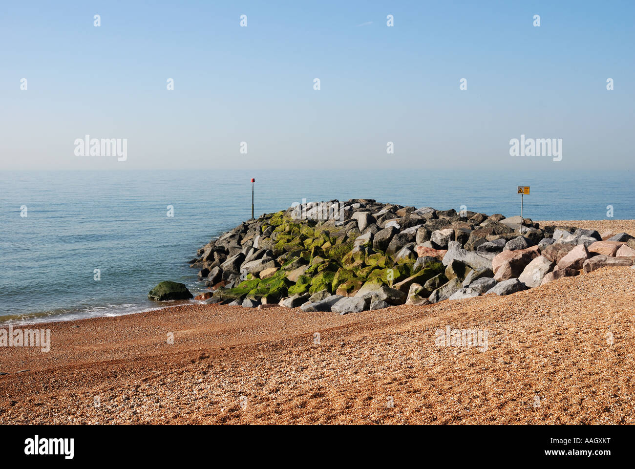 Folkestone Beach Kent England stone break water Stock Photo - Alamy