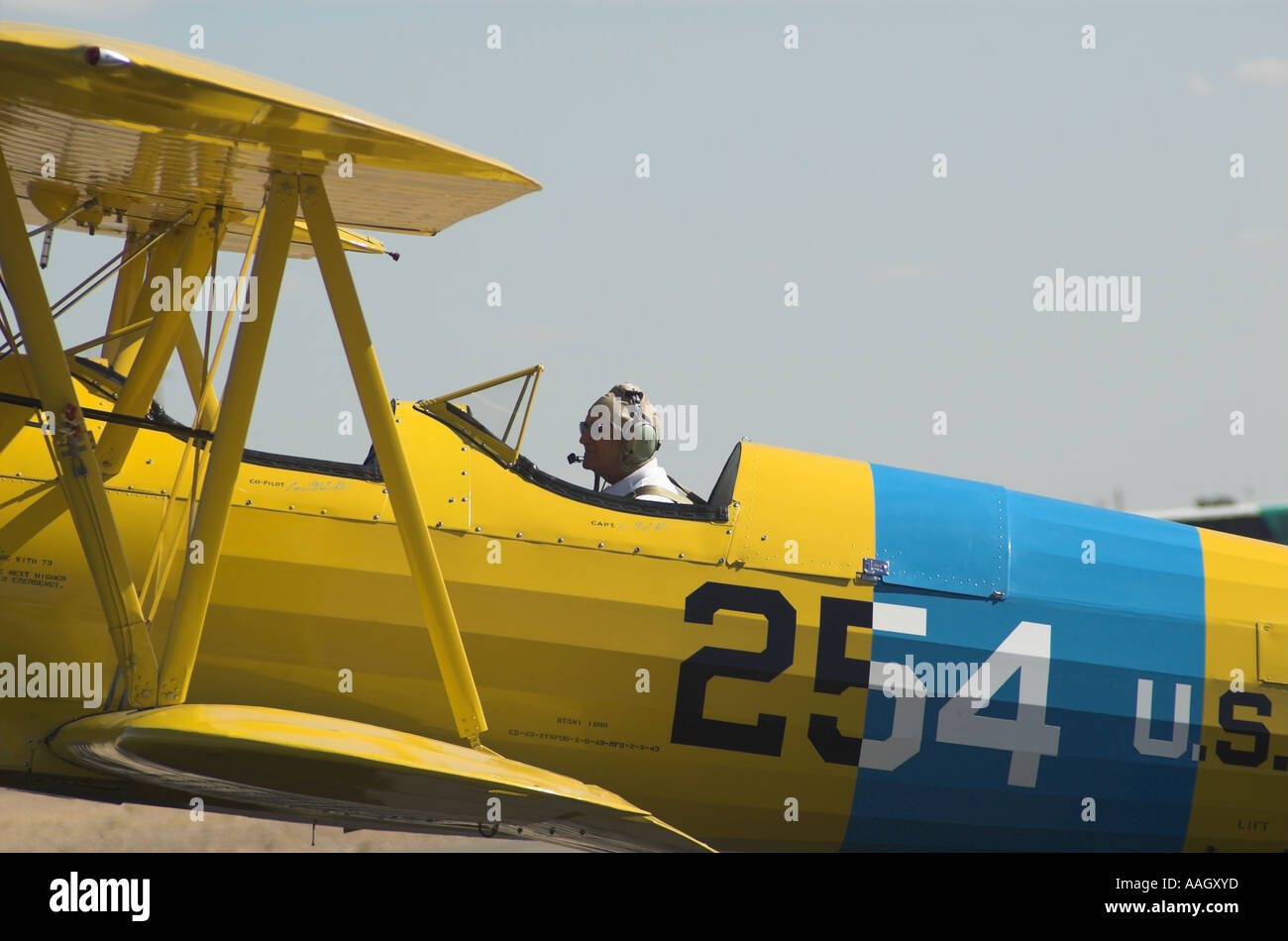 A Stearman Biplane Taxiing with Pilot in Back Seat Stock Photo - Alamy