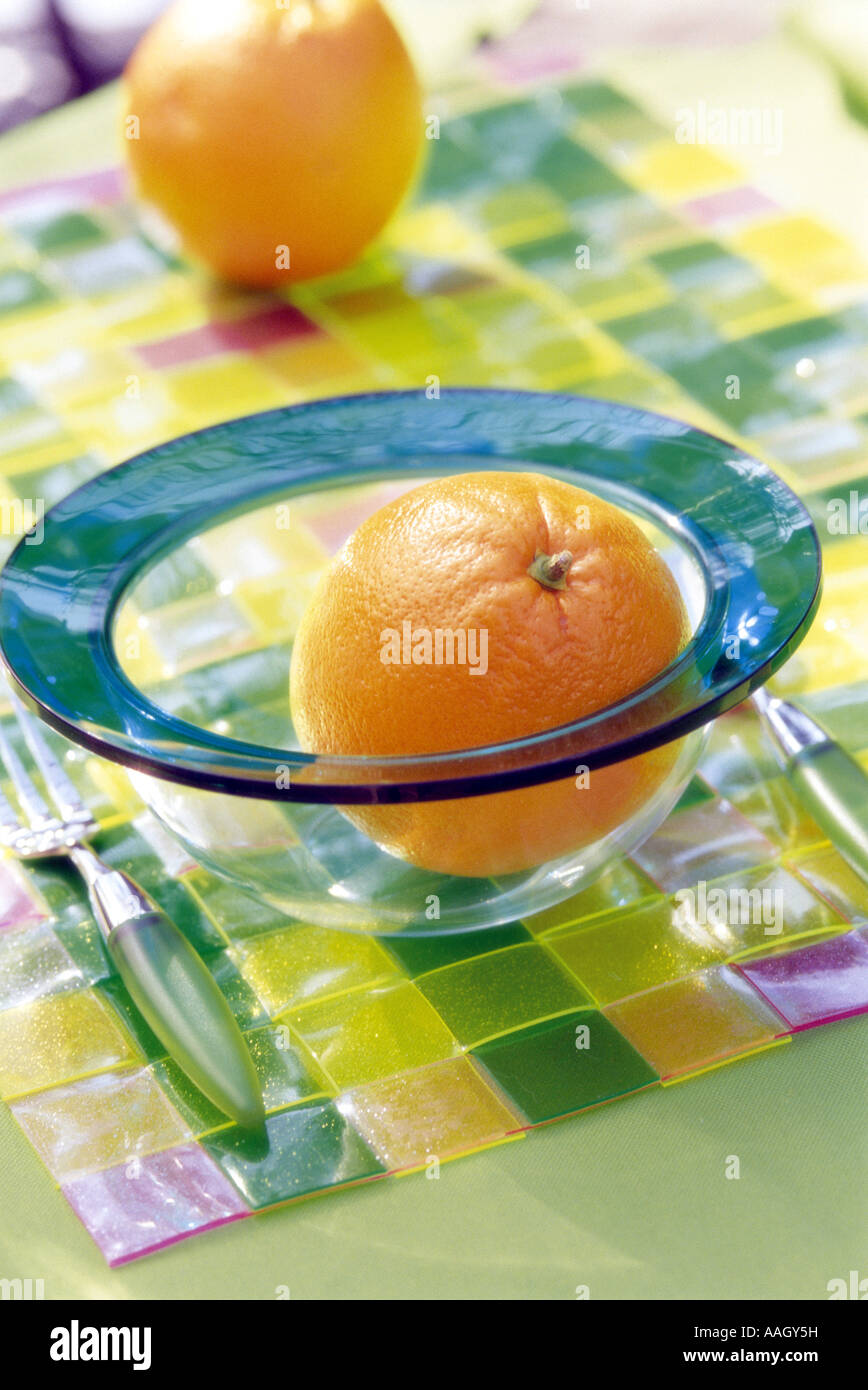 Orange on a plate Stock Photo - Alamy