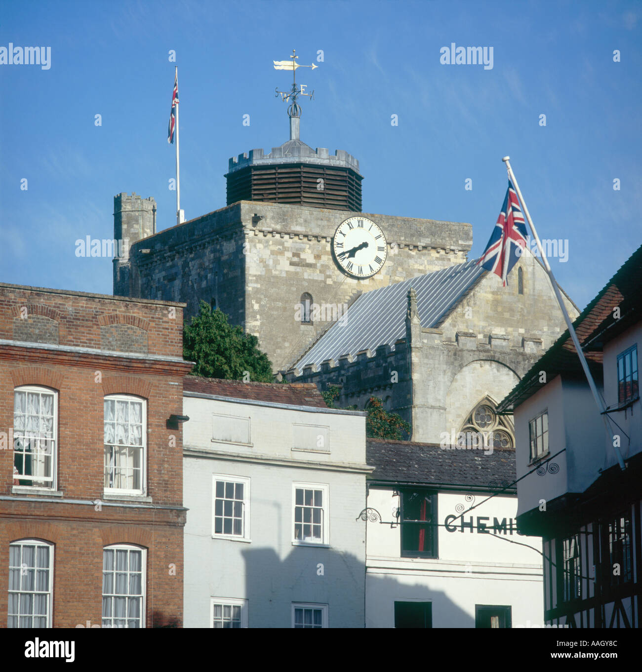The tower of Romsey Abbey dominates the buildings surrounding the ...
