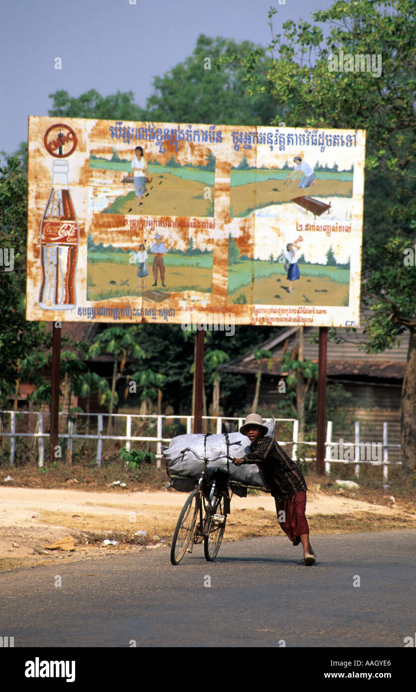 Bicycle pushed by landmine warning poster Cambodia Stock Photo - Alamy