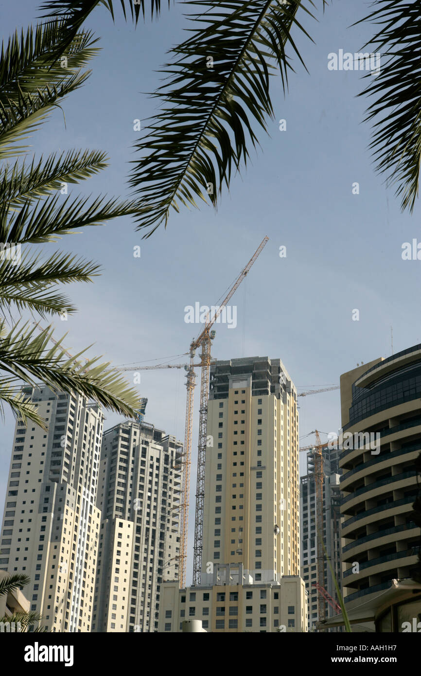 Construction of new high rise buildings in Dubai, United Arab Emirates ...