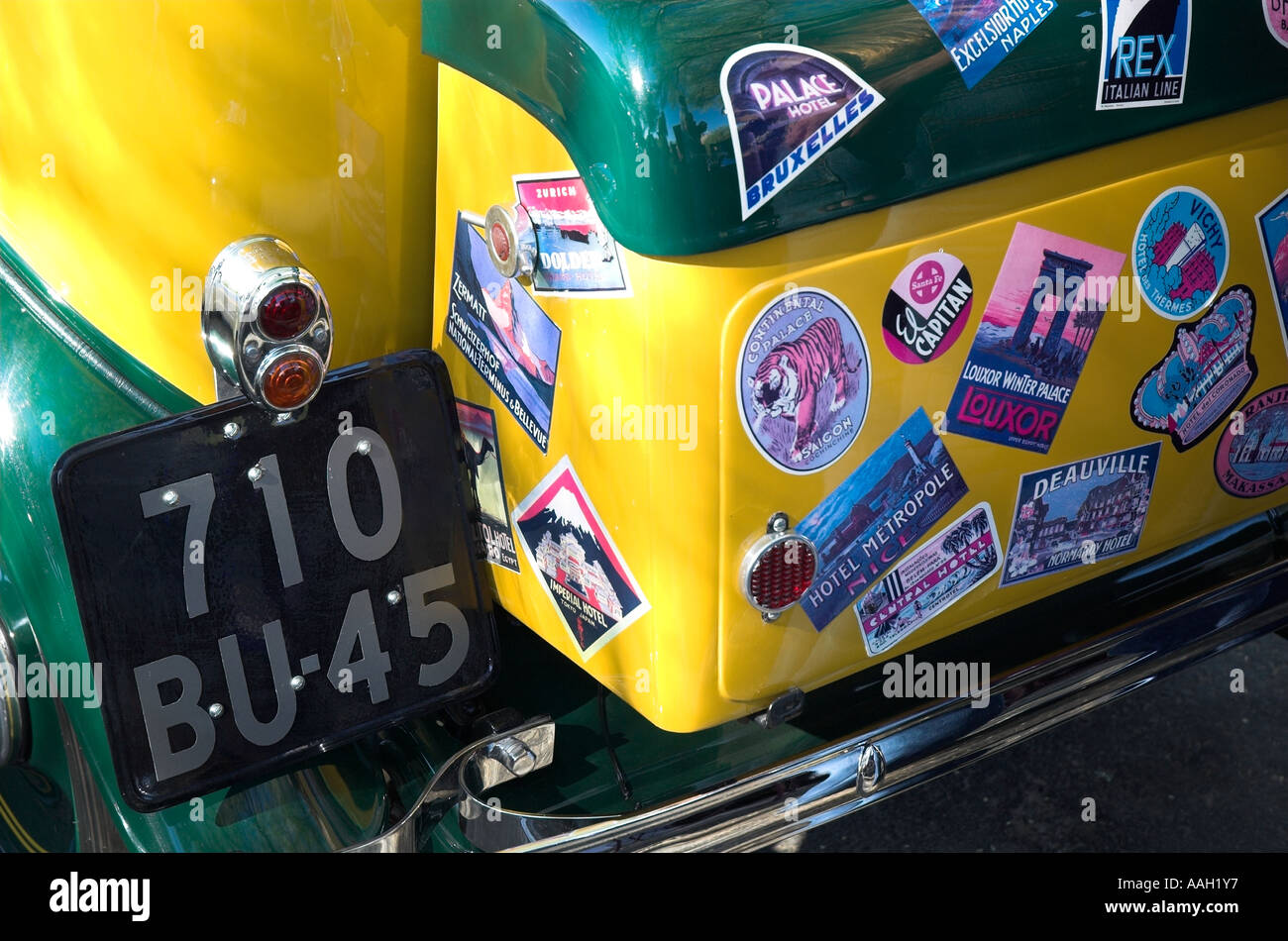 Vintage touring car trunk with stickers Stock Photo - Alamy