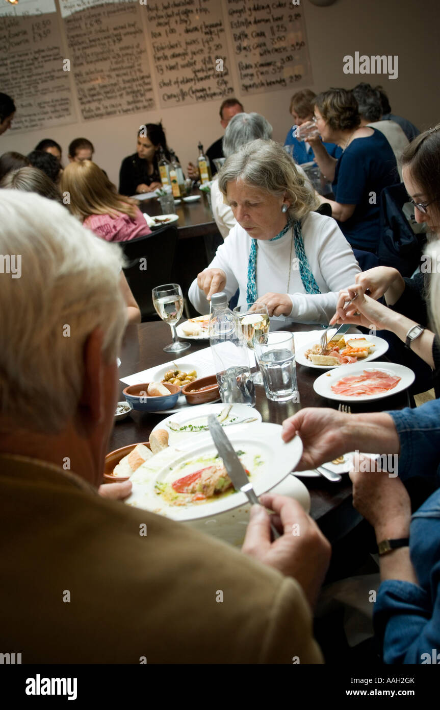 restaurant full of people eating lunch at Ultracomida delicatessen cafe ...