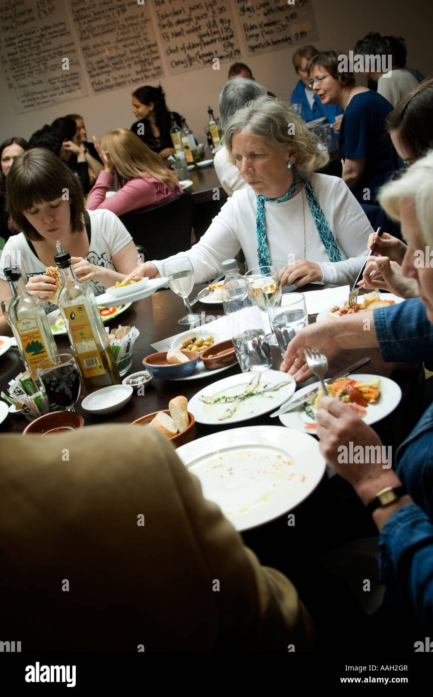 restaurant full of people eating lunch in Ultracomida delicatessen cafe ...