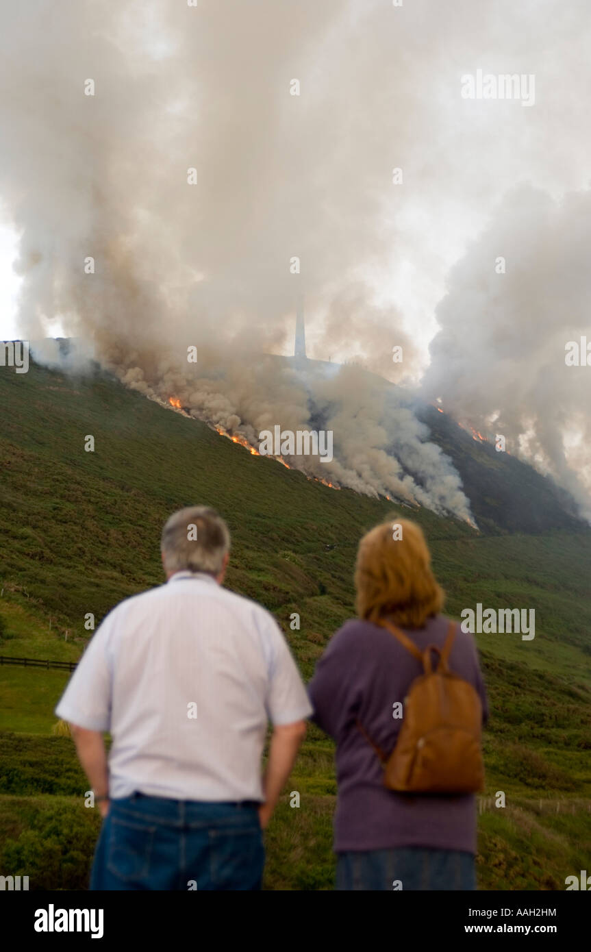 Woman watching fire outside hi-res stock photography and images - Alamy