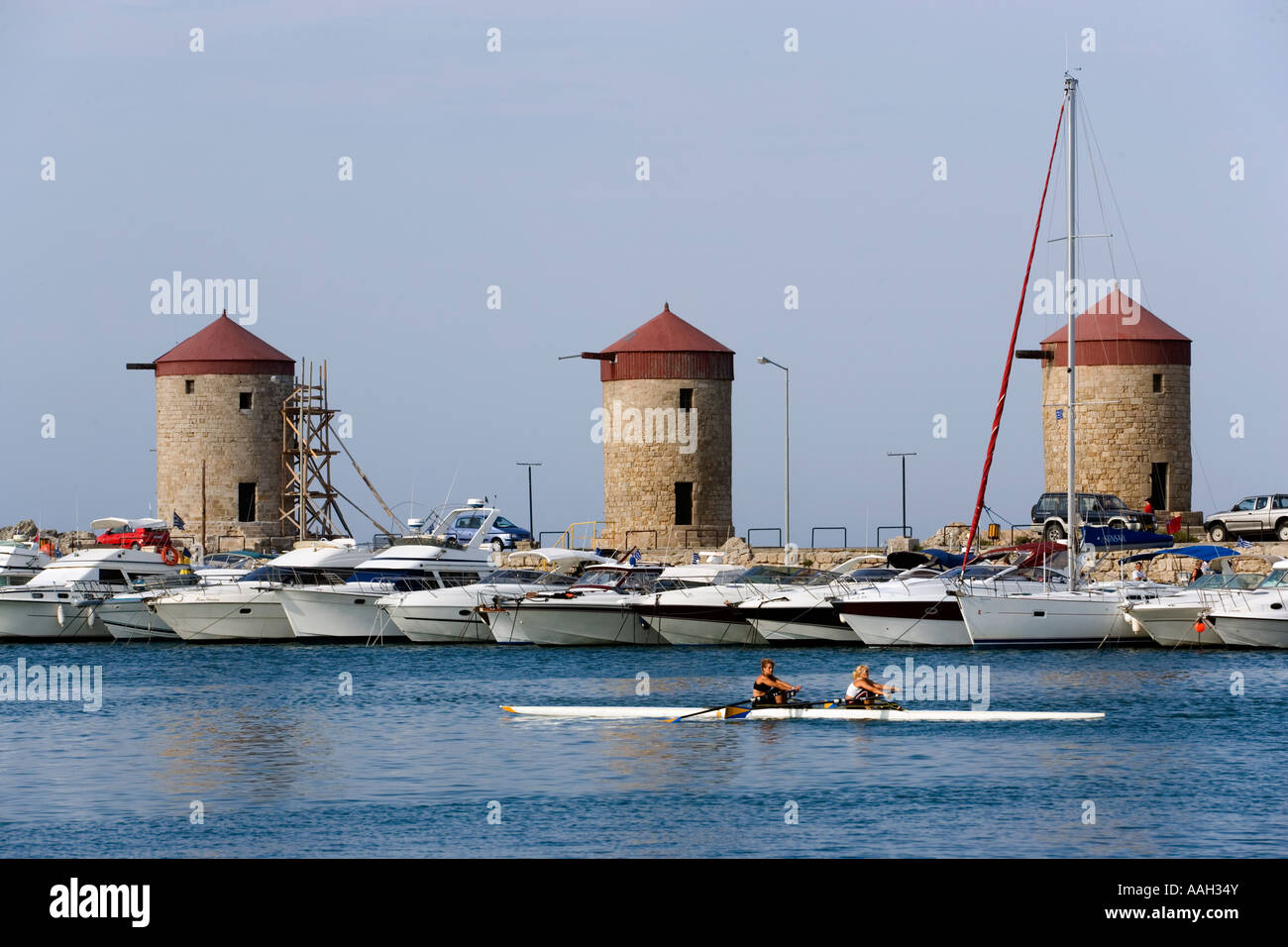 Women rowing in the Mandraki harbour Rhodes Town Rhodes Greece Stock ...