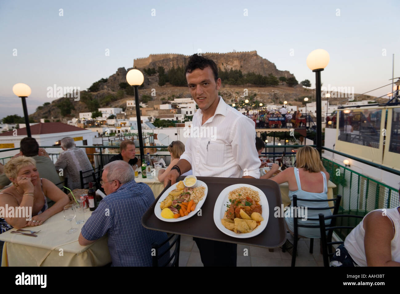 Waiter serving dinner in the Acropolis Roof Garden Restaurant Acropolis ...