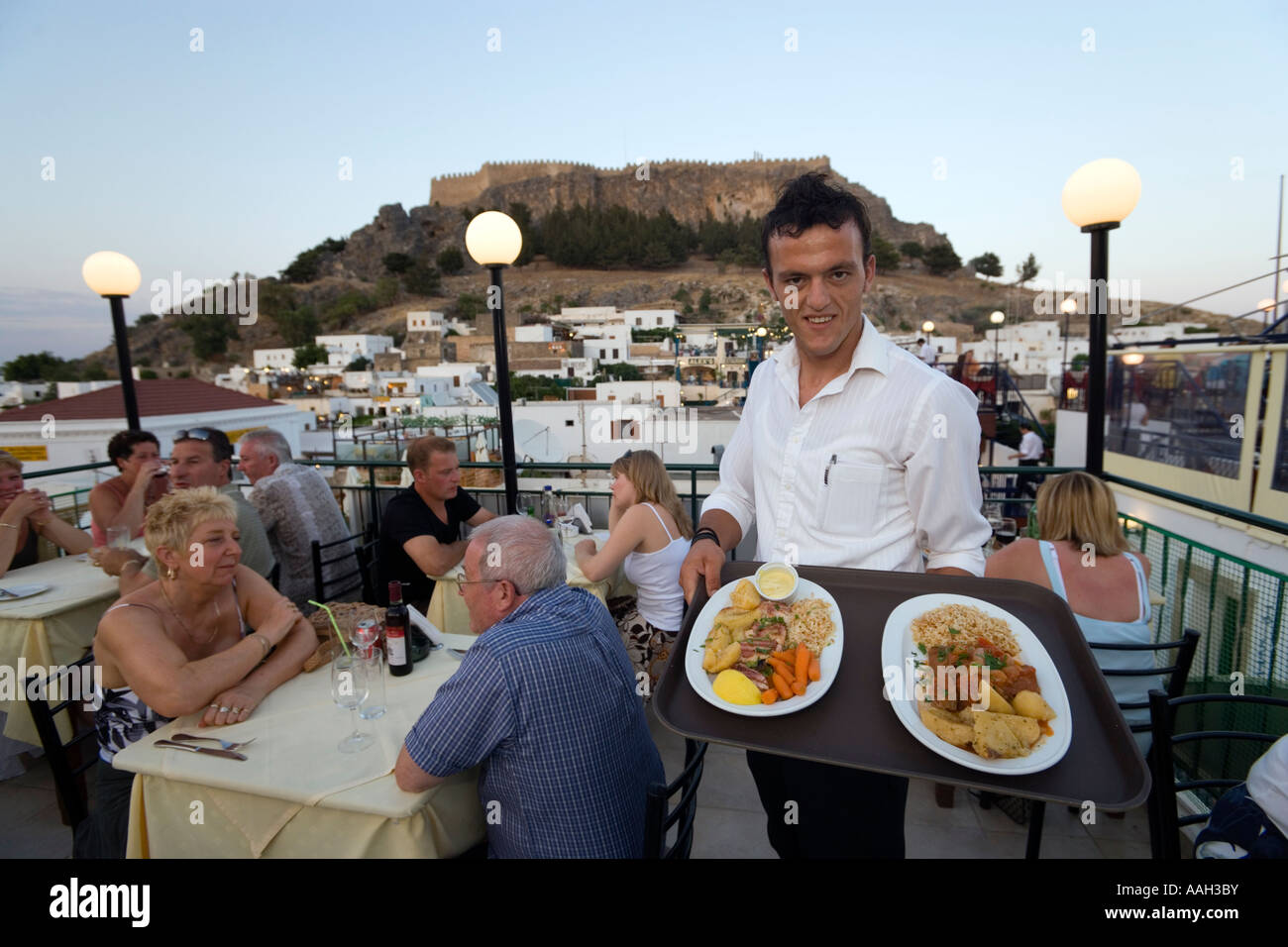 Waiter serving dinner in the Acropolis Roof Garden Restaurant Acropolis ...