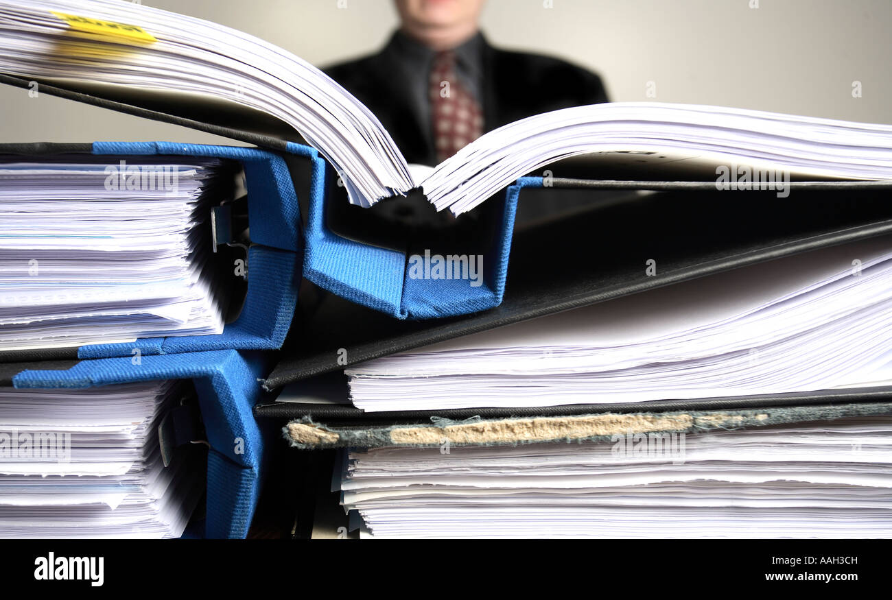 An overworked business man Stock Photo - Alamy