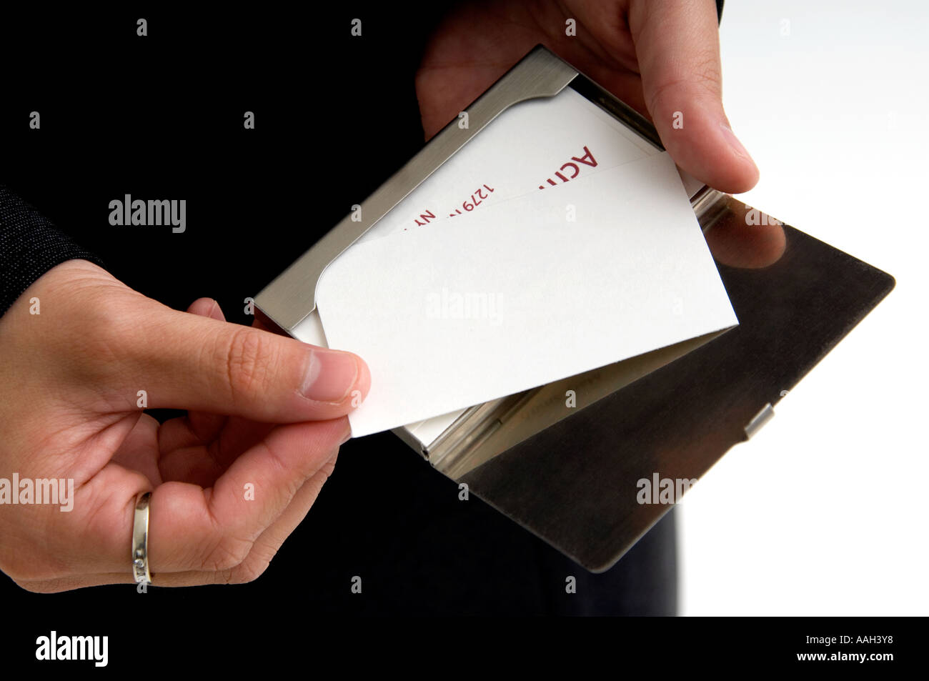 Businesswoman handing out business cards Stock Photo - Alamy