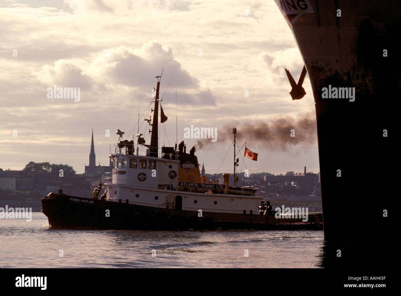 Atlantic Towing Ltd tugboat in Saint John Harbour passing an Irving Oil ...