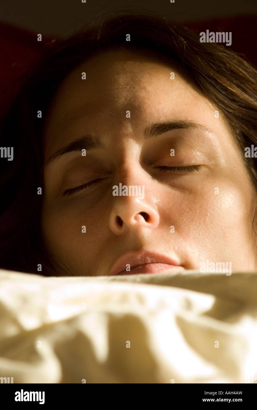 crop of the face of a woman sleeping Stock Photo - Alamy