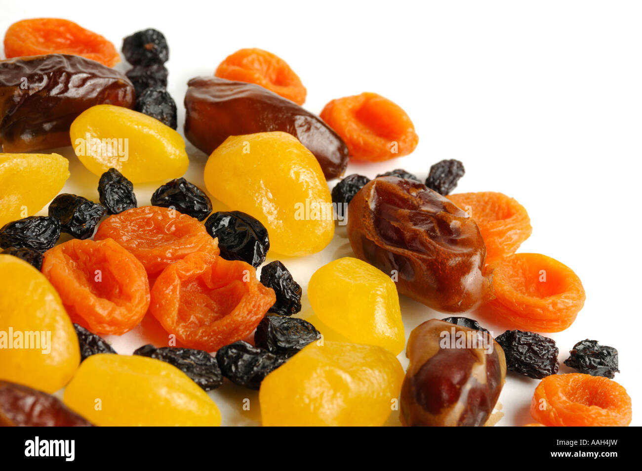 Dried fruits apricots dates lemons raisins Stock Photo - Alamy