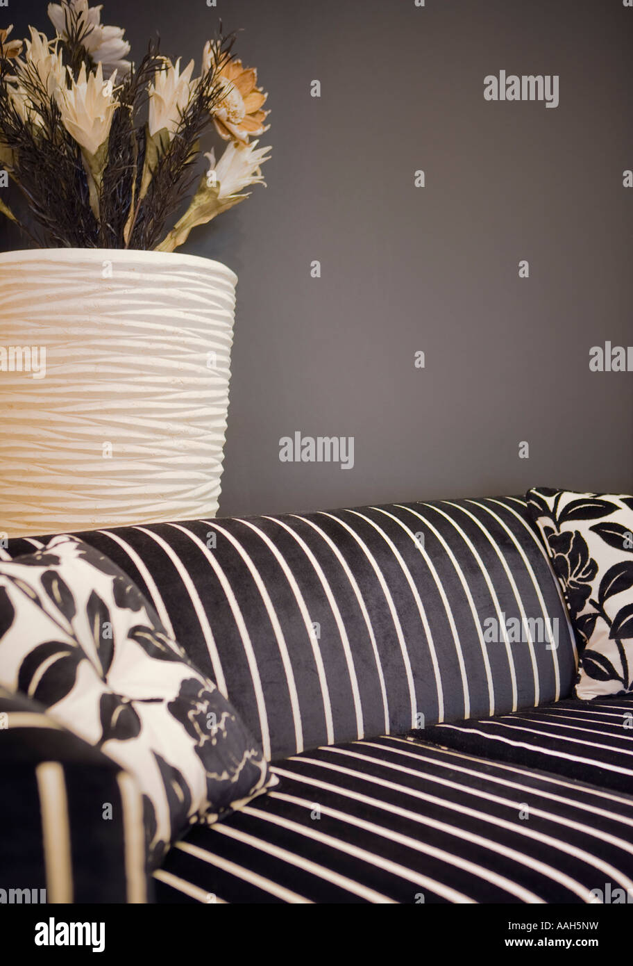 STRIPED SETEE IN A CONTEMPORARY HOME Stock Photo - Alamy